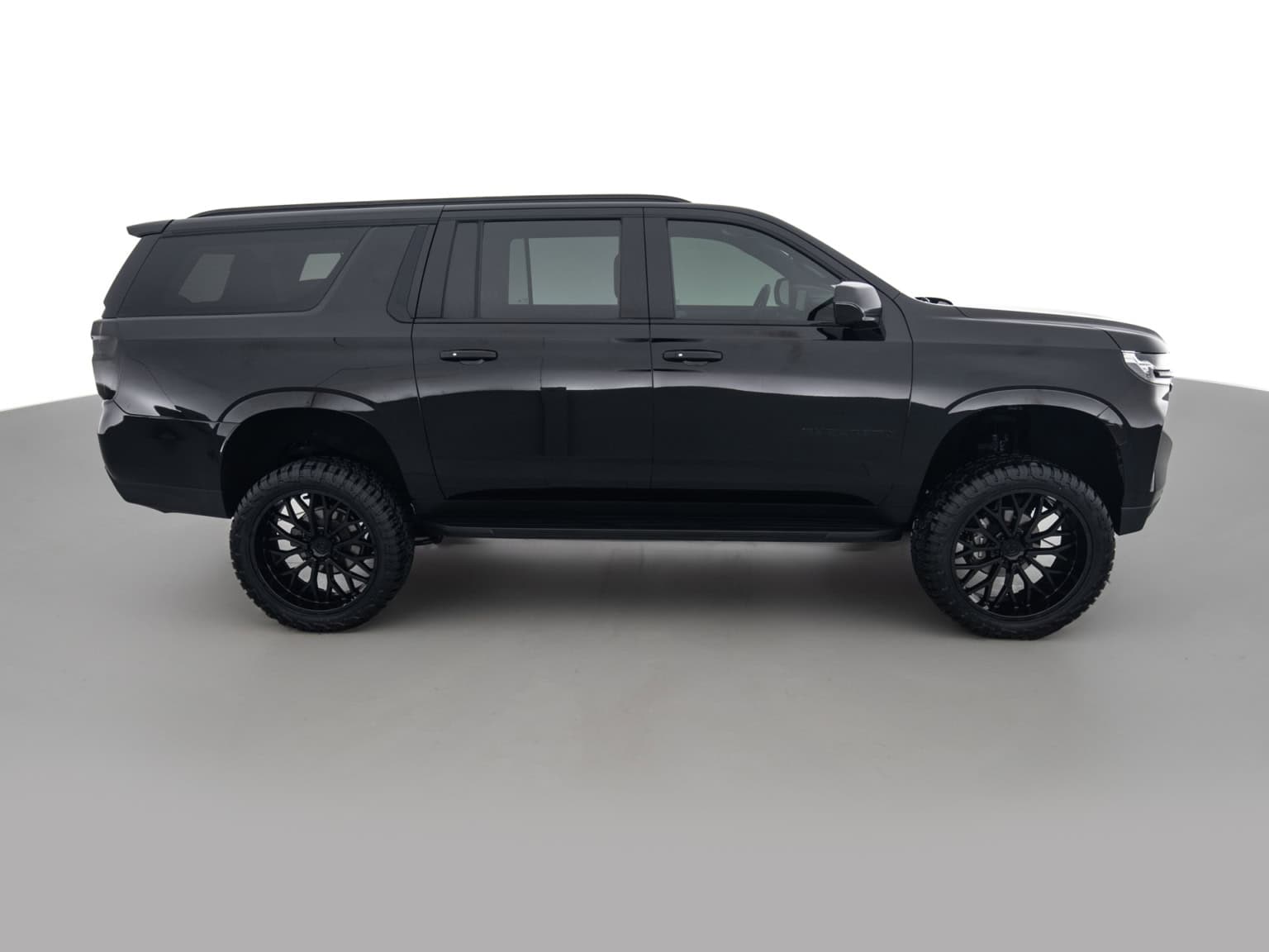 USED LIFTED 2023 CHEVROLET SUBURBAN • RST | 4WD • 5.3L V8